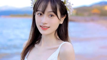 清新养眼美女海边写真图片 芒果XO