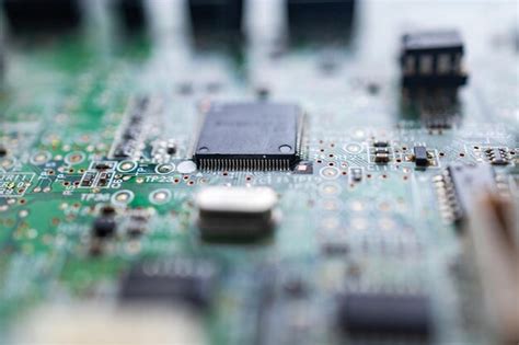 Premium Photo Microchip On Circuitry Closeup