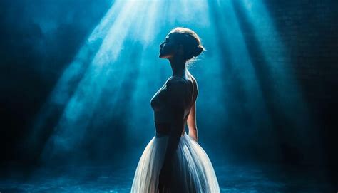 Ballerina Performing Under Spotlight On Stage Graceful Dance Portrait