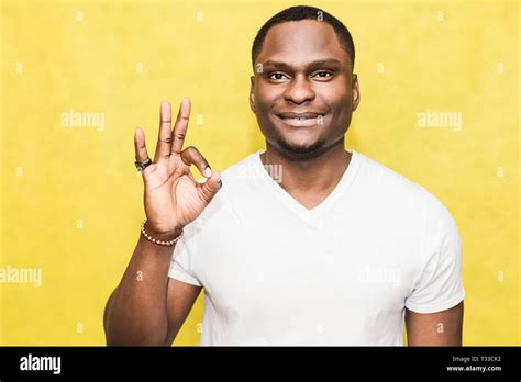 Handsome African American Man Shows Ok Sign Body Language Concept