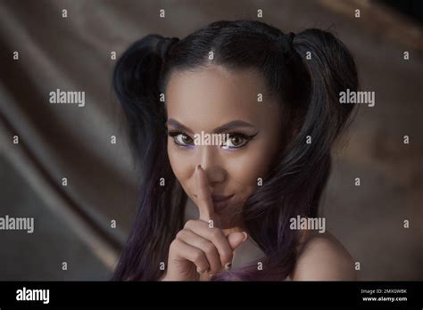 Close Up Portrait Of Young Cute Smiling Woman With Two Ponytails