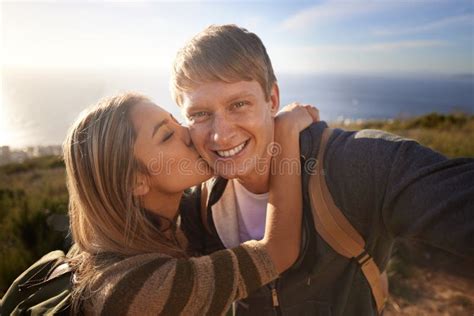 Hiking Kiss And Fitness Couple With Selfie In Nature For Bonding Fun