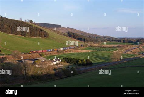 Db Cargo Class 66 Diesel Locomotive 66164 Hauling An Intermodal