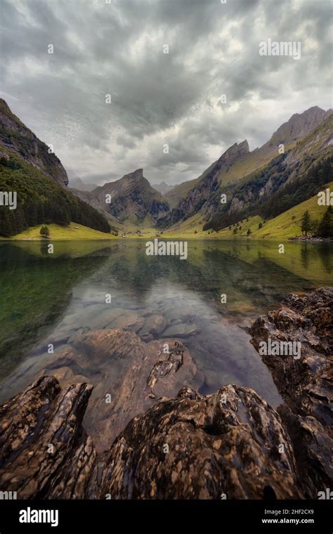 Seealpsee In The Swiss Alps During A Rainy Day Post Processed Using