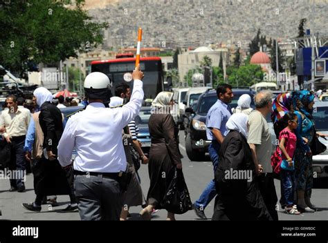 Damascus Syria 4th May 2016 A Syrian Traffic Police Officer Directs