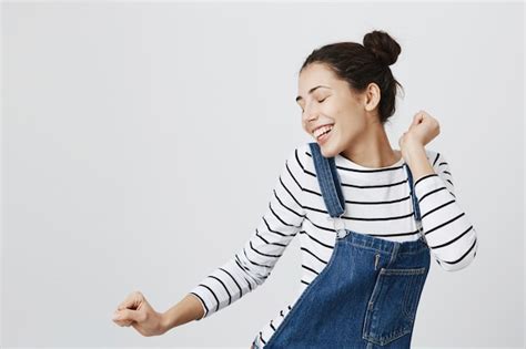 Free Photo Carefree Woman Dancing With Closed Eyes