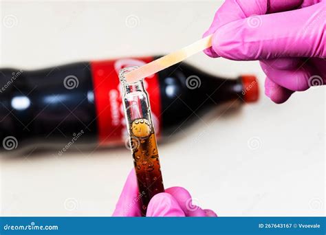 Measurement Of Ph Level Of Coca Cola Classic Editorial Photography