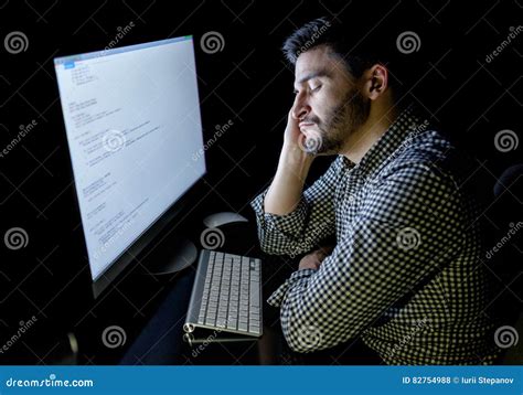 Stressed Software Developer With Computer At Home Office Stock Photo