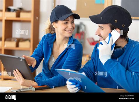 Male And Female Apprentice Carpenters Stock Photo Alamy