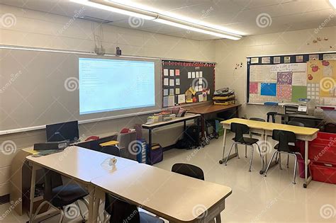 Classroom With Smart Board Projector And Computer For Digital