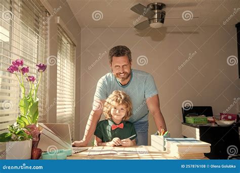 Cheerful Daddy Smiling At Camera Posing Together With Two Cute Little