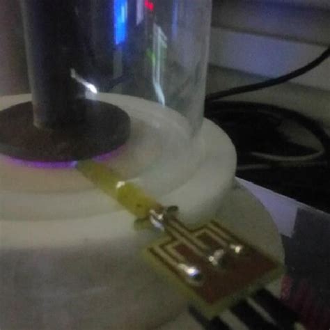 Triple Langmuir Probe Positioned For Electronic Temperature Measurement