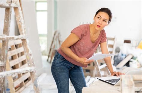 Woman Designer Using Laptop In Construction Site Stock Photo Image Of