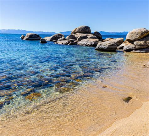 Granite Boulders On Hidden Beach Along The Lake Tahoe Shore Stock Image
