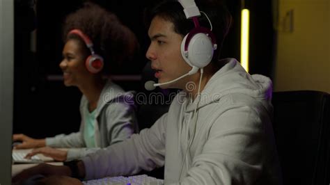 Game Streamer Using Pc Setup Playing Multiplayer First Person Shooter