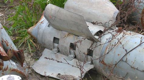 A Shell From A Multiple Rocket Launcher System In The Grass Russian
