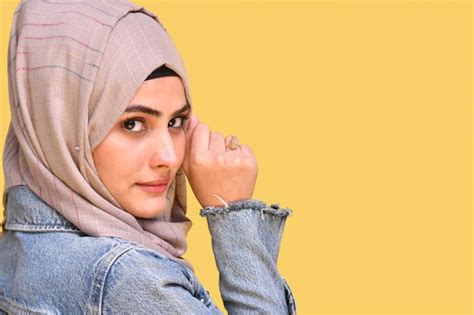 Premium Photo Beautiful Girl Wearing Hijab With Denim Jeans Posing On
