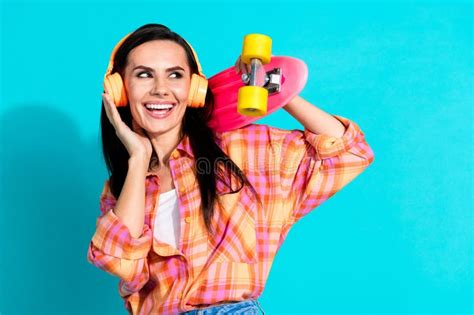 Photo Portrait Of Lovely Young Lady Earphones Skater Look Empty Space