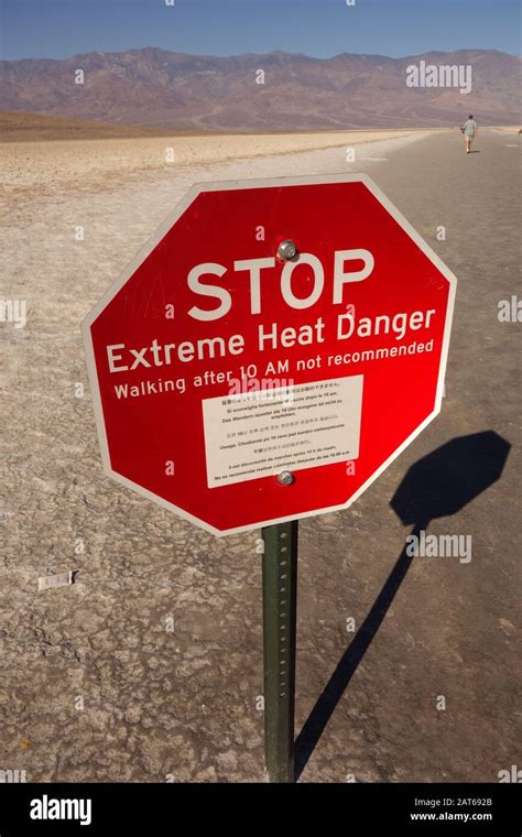 A Stop Sign Danger Sign Heat Warnings Sign At Badwater Basin In