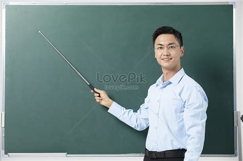 Male Teacher Giving A Lecture With A Teaching Stick Picture And Hd