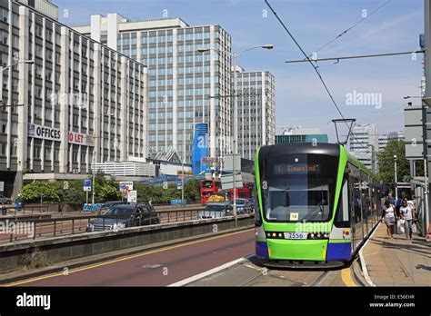 A Tram On The Croydon Tramlink System Stops On Wellesley Road In