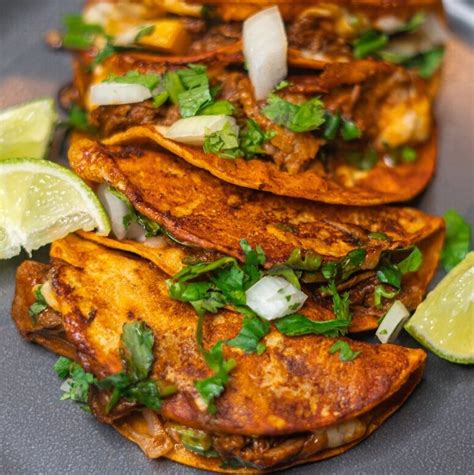 Quesa Birria Tacos With Consomé Eating With Blim