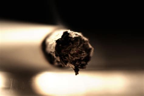 Premium Photo Close Up Of Lit Cigarette