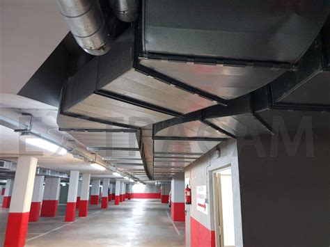 Instalación conducto extracción de humos en parking Barcelona EXTRACAM Especialistas en