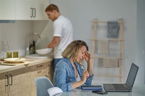 Premium Photo Woman Took Off Her Glasses And Rubs Her Eyes While