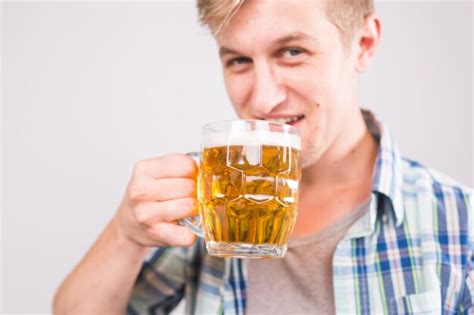 Premium Photo Man Drinks Beer Handsome Young Guy Drinking Lager Pint