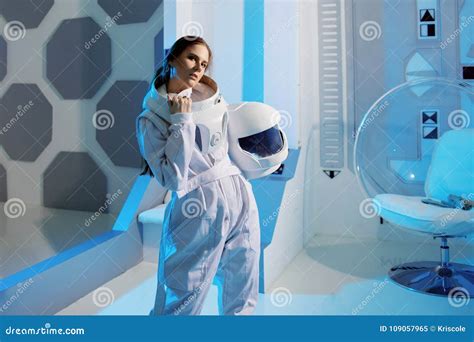 Portrait Of A Woman Astronaut In A Space Suit Dreamy Look Up