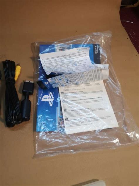 Playstation Brand New Ice White Playstation 3 With Dual Controllers And 10 Awesome Games Was