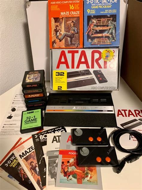 Atari 2600 Jr Cib 2 Joysticks And 7 Games 2x Cib And Catawiki
