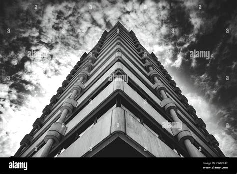 Upward View Of A Modern Building In Black And White With Dramatic