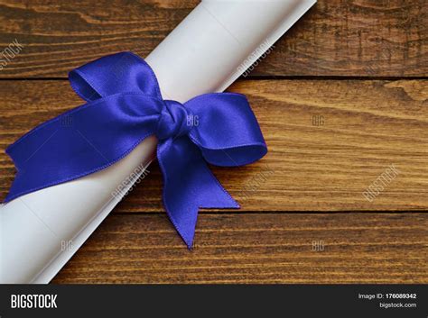 Rolled Diploma Blue Ribbon
