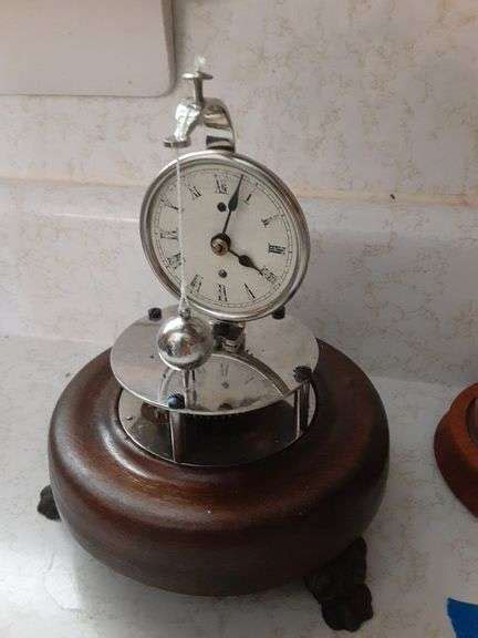 Small Rotary Pendulum Clock And Watch Stand Delaware Auction Center
