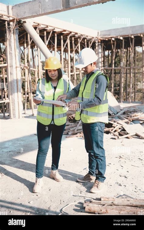 Two Specialists Inspect Commercial Industrial Building Construction