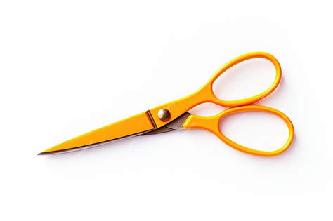 Premium Photo Orange Scissors On White Background