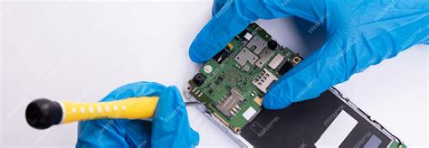 Premium Photo Assembling A Mobile Phone On A White Background