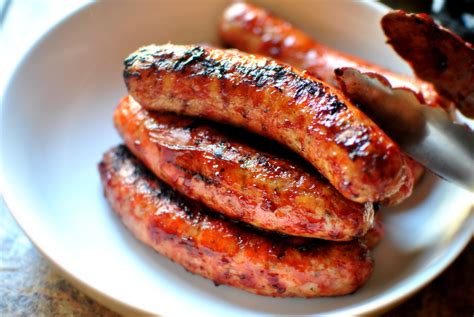Barbecue Sauced Chicken Brats With Pickled Red Onion And Spicy Brown