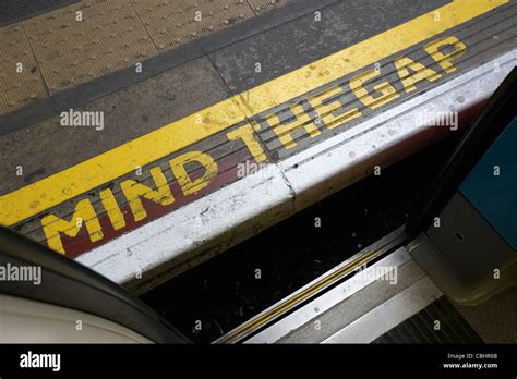 Mind The Gap Between Platform And Train At London Underground Station
