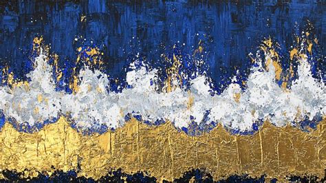 Experience The Beauty Of Nature As Waves Crash Upon A Sandy Shore In An Aerial View Of Artistic