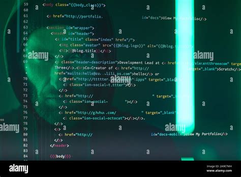 Close Up Of Computer Screen With Codes And Symbols With Computer Hacker