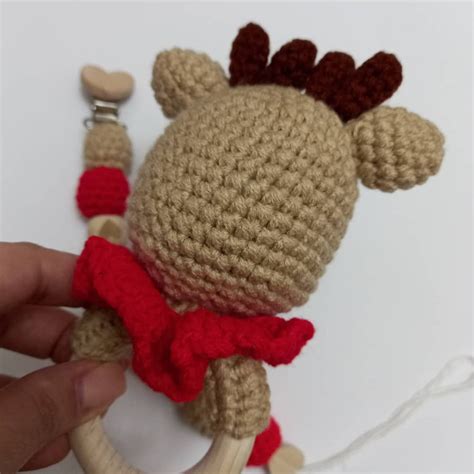 قیمت و خرید عروسک بافتنی مدل دندون گیر به همراه بند پستونک طرح گوزن