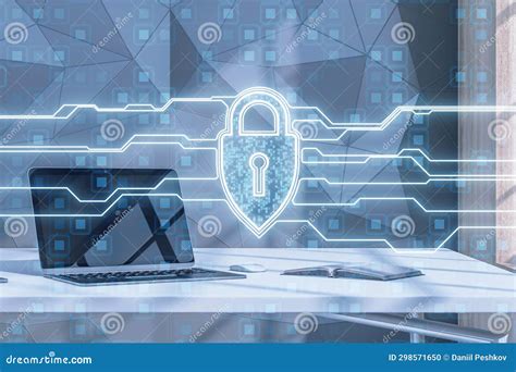 Close Up Of Workplace Desk With Laptop And Creative Web Protection Sign With Binary Coding On