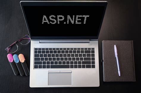 Laptop With Aspnet Text Top View Aspnet Inscription On Laptop Screen