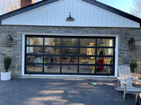 Contemporary Black Aluminum And Clear Tempered Glass Garage Door — Lux