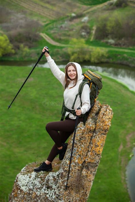 Young Woman With Backpack Hiking In The Mountains Hiking Concep Stock