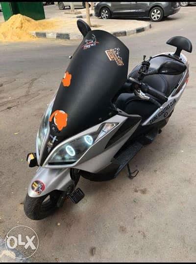 Scooter Kymco Downtown سكوتر كيمكو داون تاون موتوسيكلات و إكسسواراتها