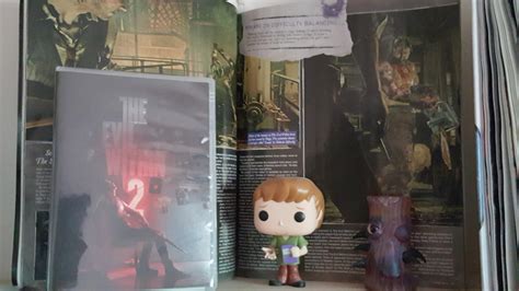 Tew In A Magazine And A Copy Of Tew 2 On A Shelf In My Bedroom R